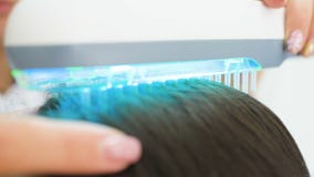 Dermatologist Performs The Procedure Of Ultraviolet Comb To Cure ...