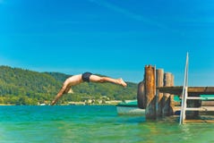 Man diving into lake stock image. Image of lake, trunks - 7379647