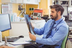 PC Doctor Examining A Computer Stock Photo - Image: 1941900