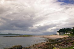 Dramatic sky on a beautiful beach Stock Photos