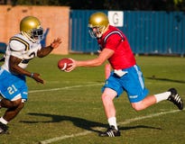 Quarterback Hand Off / Football Editorial Stock Image - Image: 11393289