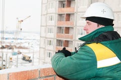 Foreman Builder And Construction Worker With Blueprint In Indoor ...