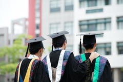 Three Graduates In Cap And Gown Stock Image - Image of happiness ...