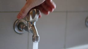 Hand closing the tap stock footage. Video of closing - 64721964
