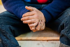 Labor's Hands In Safety Gloves Conection. Stock Image - Image: 1412291