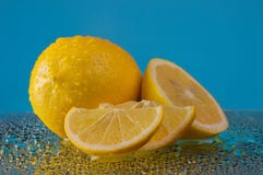 Lemons in blue water stock image. Image of food, spring - 1087243