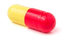 Macro Of Red And Yellow Capsule Pill Isolated Stock Image - Image of ...