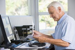 Man In Home Office With Computer And Paperwork Royalty Free Stock Image ...
