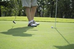 Man Putting At Golf Course. Stock Photos - Image: 2038323
