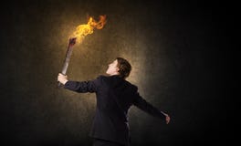 Man Holding Torch Light Stock Photos, Images, & Pictures - 278 Images