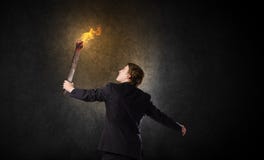Man Holding Torch Light Stock Photos, Images, & Pictures - 278 Images