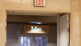 Motion Of Emergency Exit Sign On Ceiling Inside Shopping Mall Stock ...