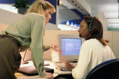 Busy telephone operator stock photo. Image of assistant - 4338800