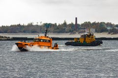 Orange tug/pilot boat stock photo. Image of cruise, fast - 8112742