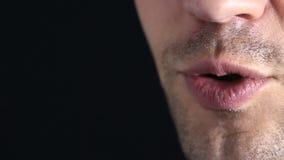 A Person Whisper Into The Camera. Close-up Of The Lips. Whisper On A ...