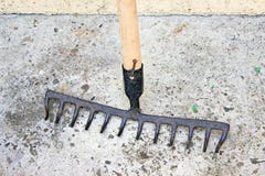 Man Raking Concrete Stock Photo - Image: 6847200
