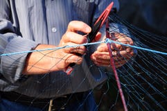Repairing Fishnet Stock Photos - Royalty Free Stock Images