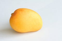 Small mango stock photo. Image of yellow, macro, mango - 13772554