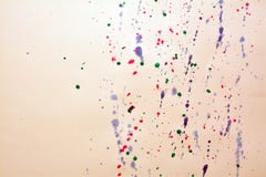 Color Drop. Orange And Green Ink On White Background. Stock Photo ...