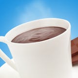 Cup Of Steaming Hot Cocoa With Chocolate Squares Stock Photo - Image of ...