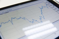 Analyzing Financial Chart On Apple Ipad Stock Image - Image of business ...