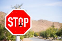 Smiley with stop sign stock vector. Illustration of emoticon - 30793391