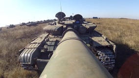 Tank With Camera On The Large-calibre Cannon Is Rotating Its Gun Turret ...