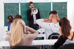 Teacher Shouting Through Megaphone On University Students Stock Image ...
