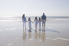 Three Sisters Holding Hands Stock Photo - Image of children, coastline ...