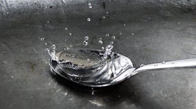 Water On Spoon Stock Photography - Image: 1570412