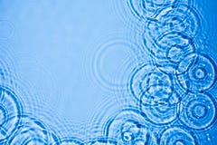 Ripples Overlapping On Water Close-up Royalty Free Stock Photo - Image ...