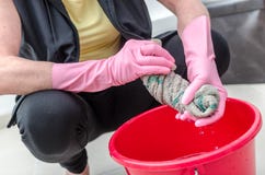 Wringing a cleaning cloth stock photo. Image of bucket - 31174912