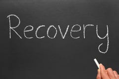 The Word Recovery On Puzzle Pieces Stock Photo - Image: 39792762