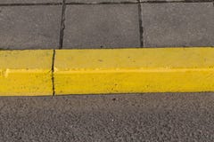 Yellow Curb Line On The Road Stock Photo - Image of lane, divide: 42222408