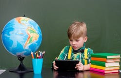 Boy Using Digital Tablet In Computer Class Royalty Free Stock Photo ...