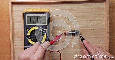 AA Battery Cells Voltage Checking Stock Video - Video of battery ...