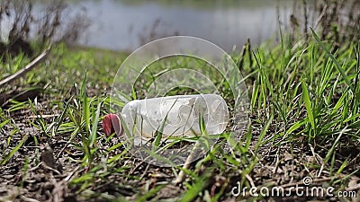 Abandoned Garbage Plastic and Glass Waste in Nature among the Grass ...