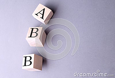 ABB Word On Wooden Block On Gray Background Stock Photography ...
