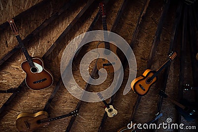 Acoustic Guitars Hanging From The Ceiling Stock Photo | CartoonDealer ...