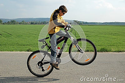 Acrobat On Bicycle Royalty Free Stock Image - Image: 4771106