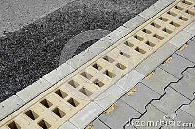 Across The Path There Is A Channel With A Metal Grid For Drainage ...