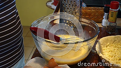 Adding Milk and Cream To Egg Mixture for Quiche Stock Footage - Video ...