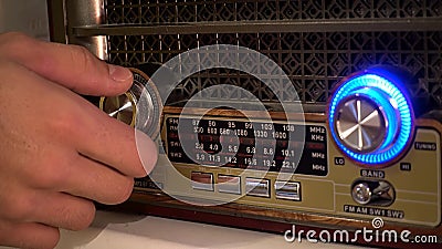 Adjusting The Volume Knob Of The Retro Radio Stock Video - Video of ...