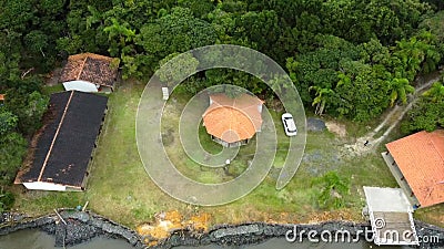 Aerial Shot of a House in a Green Landscape during the Day Stock Video ...