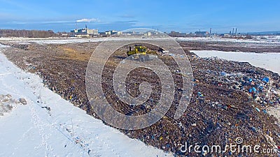 Aerial: Tractor Working at the Garbage Dump. Landfill, Garbage Dump ...