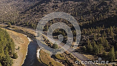 Aerial View of a Car Driving Along a Riverside Highway Stock Footage - Video of birds, trees ...