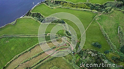 Drone Shot of a Cliff with Green Fields and Meadows Stock Video - Video ...