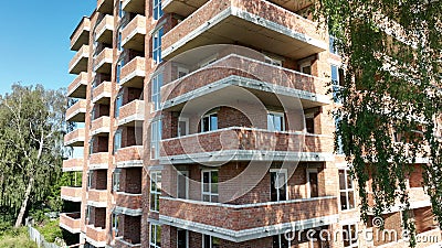 Aerial View Facade of a Multi-story Brick Building. House Under ...