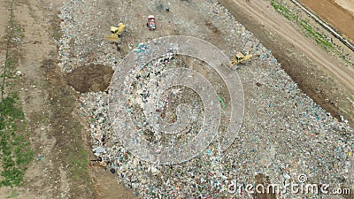 Aerial View of Garbage Dump or Junk Yard. Dump Trucks Unloading Waste ...