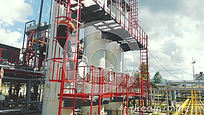 Aerial View Gas Station Operator Descends from the Top of the Station ...